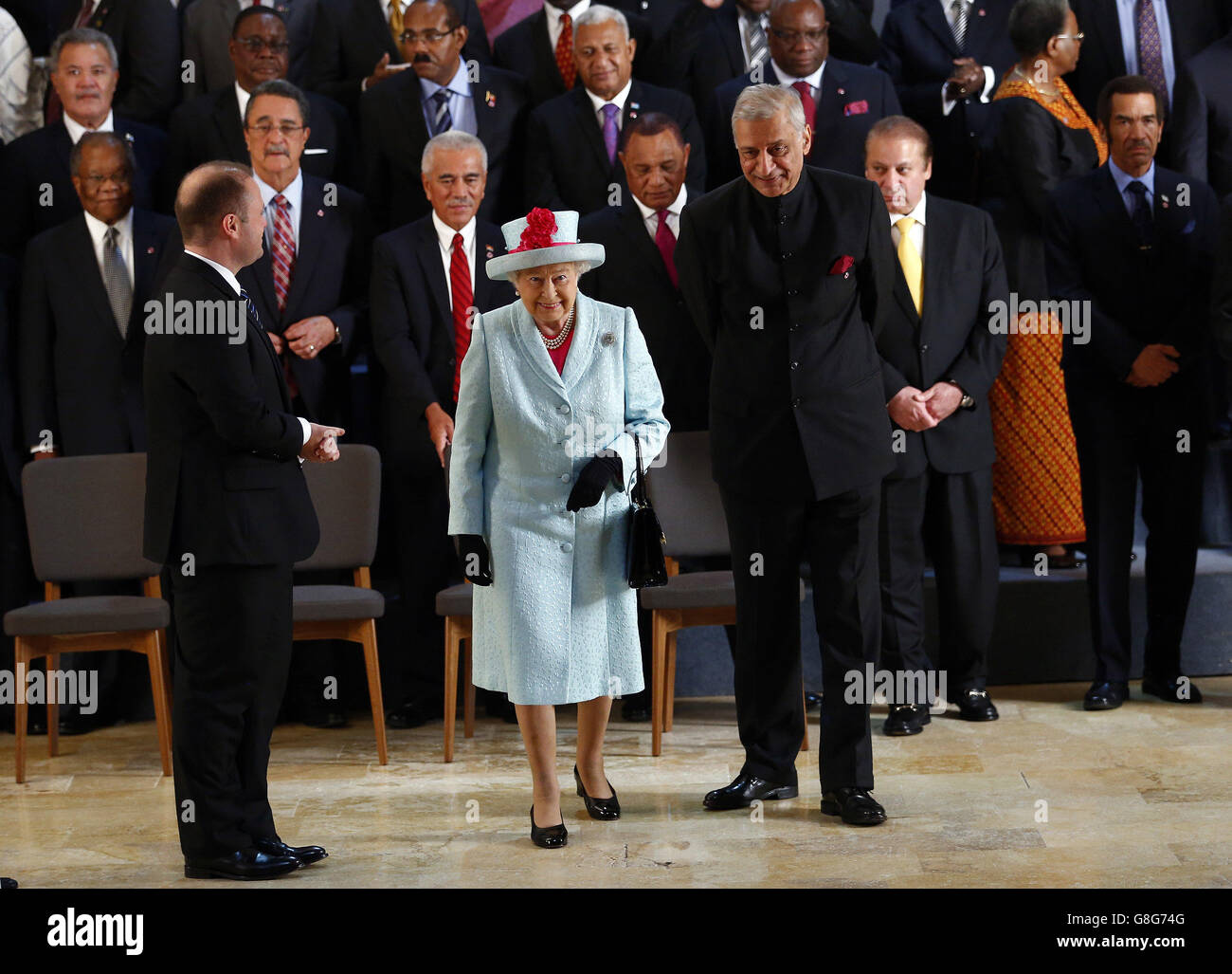 Queen Elizabeth II walks with Secretary General of the Commonwealth ...