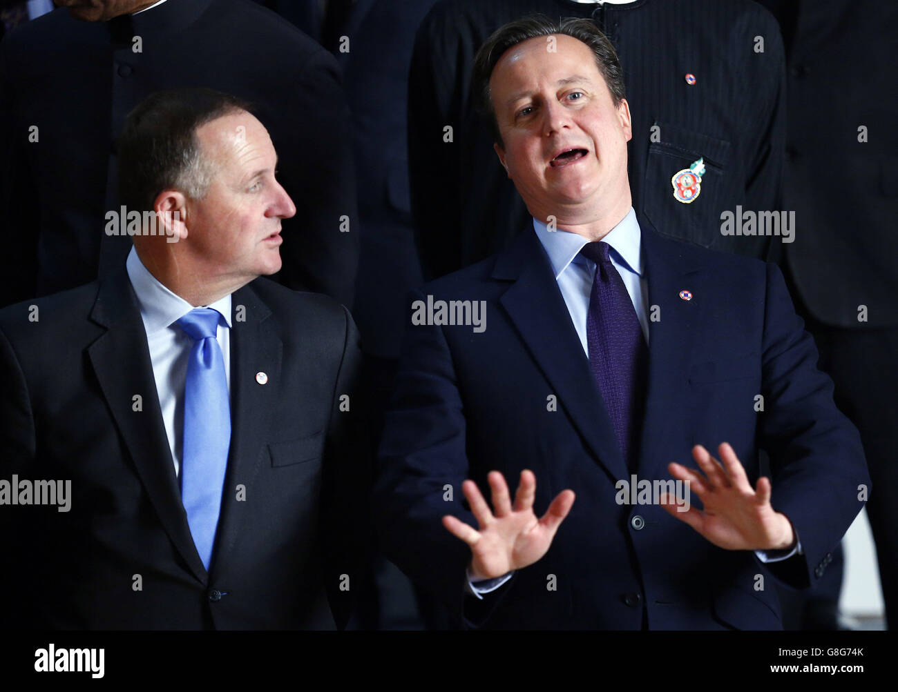 Prime Minister David Cameron reacts as he talks with his New Zealand ...
