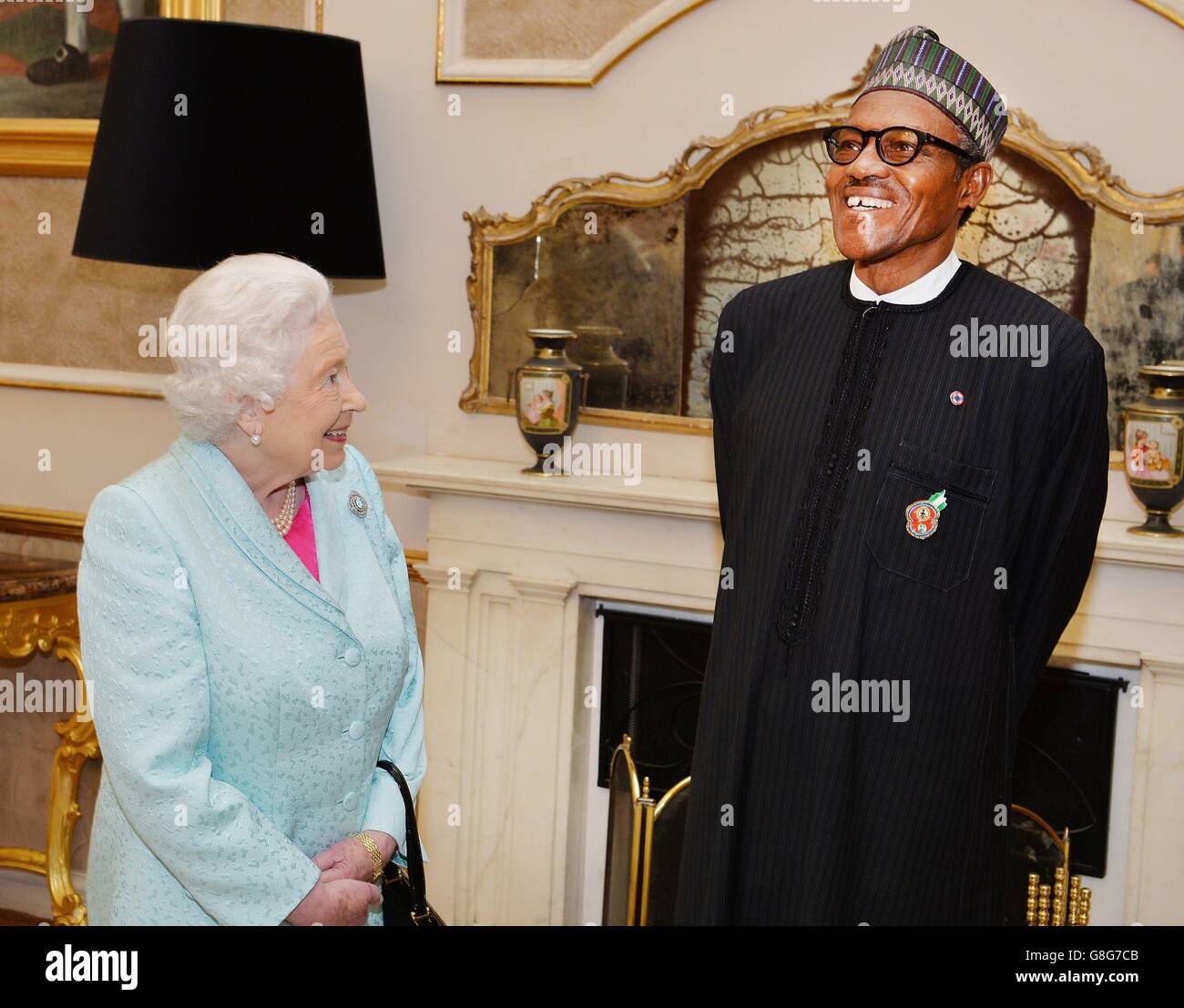 Queen Elizabeth II talks to President Muhammadu Buhari of Nigeria ...