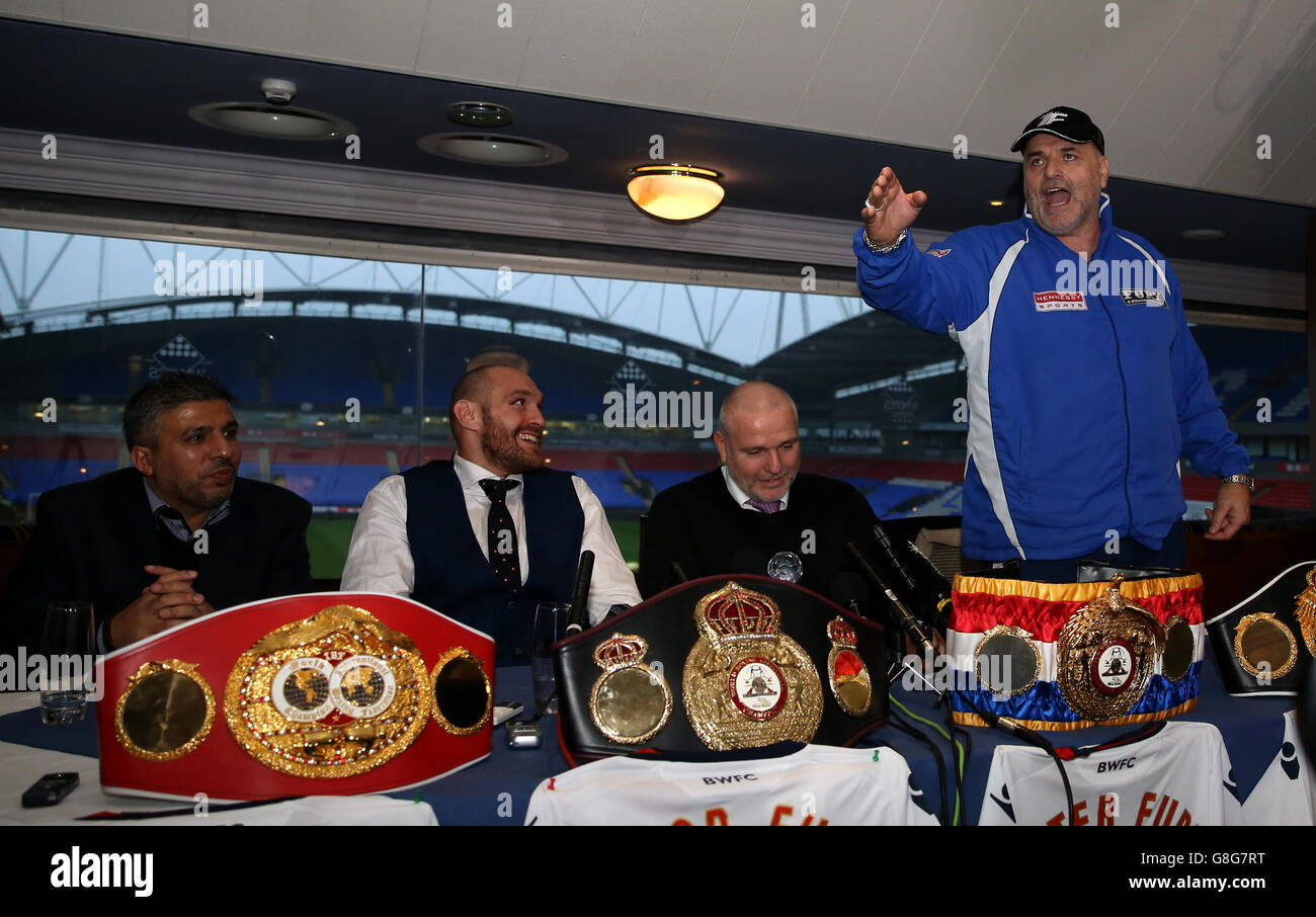 Tyson Fury (left) and trainer Peter Fury (centre) and father John Fury ...