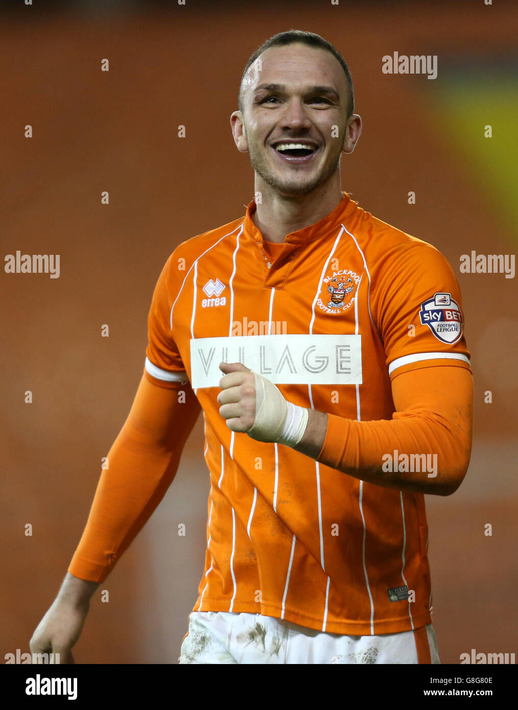 Blackpools tom aldred celebrates victory after the match hi-res stock ...