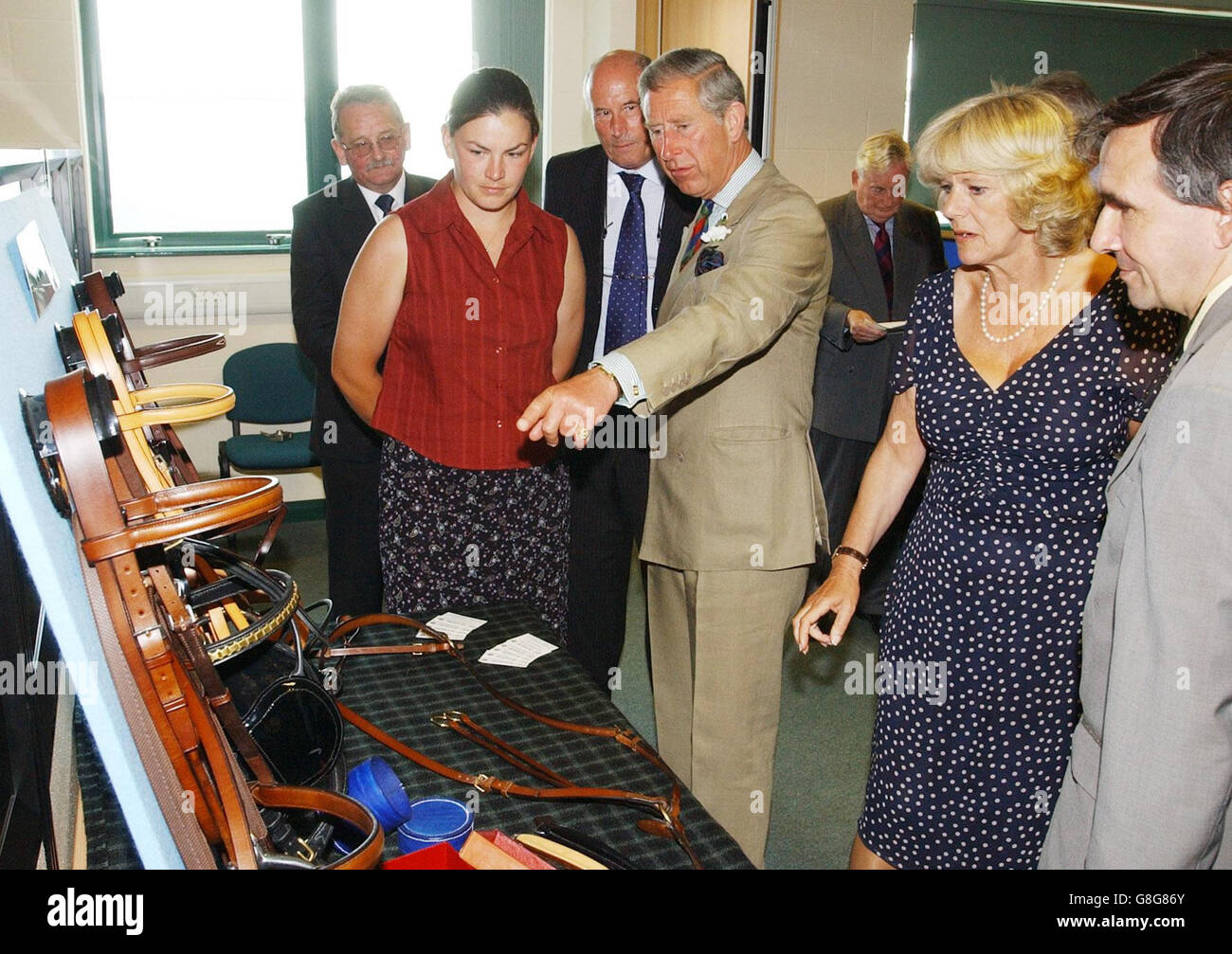 The Prince of Wales and the Duchess of Cornwall talk with Helen Reader ...