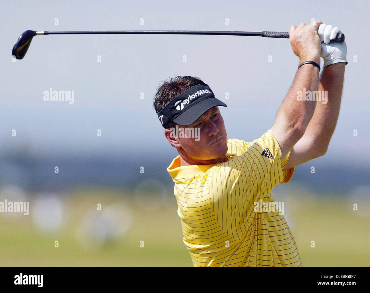 Defending champion USA's Todd Hamilton lines up a putt on the 17th ...