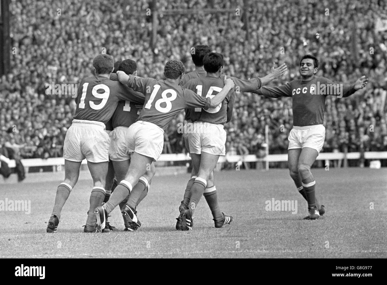 USSR's Igor Chislenko (second l) celebrates his winning goal with ...