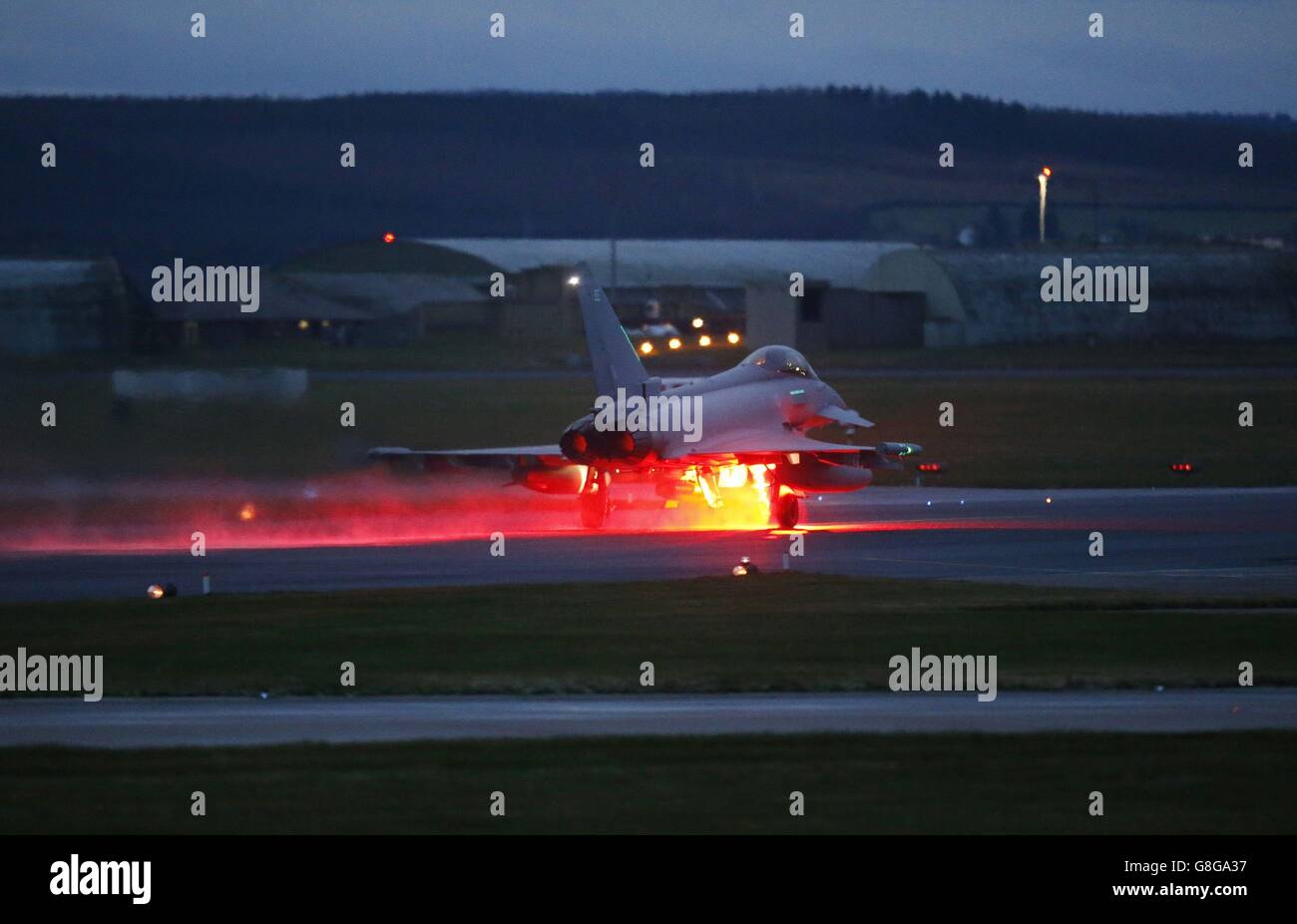 A Eurofighter Typhoon jet takes off from RAF Lossiemouth in Scotland ...