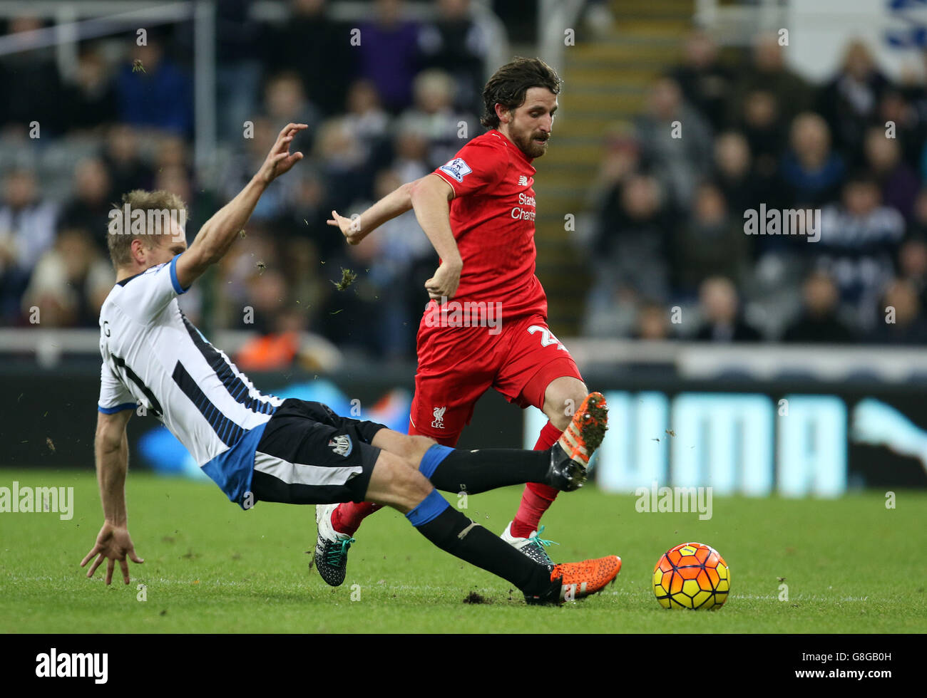 Newcastle United's Siem de Jong (left) and Liverpool's Joe Allen battle ...