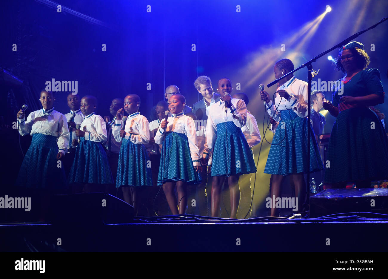 Prince Harry (centre) with Sentebale charity co-founder Prince Seeiso ...