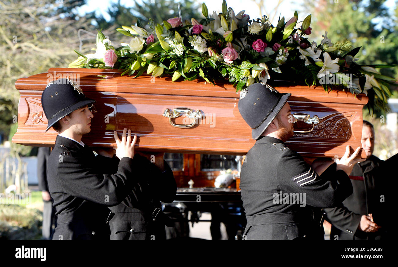 Actors dressed as policemen carry the coffin of Cynthia Payne to her ...