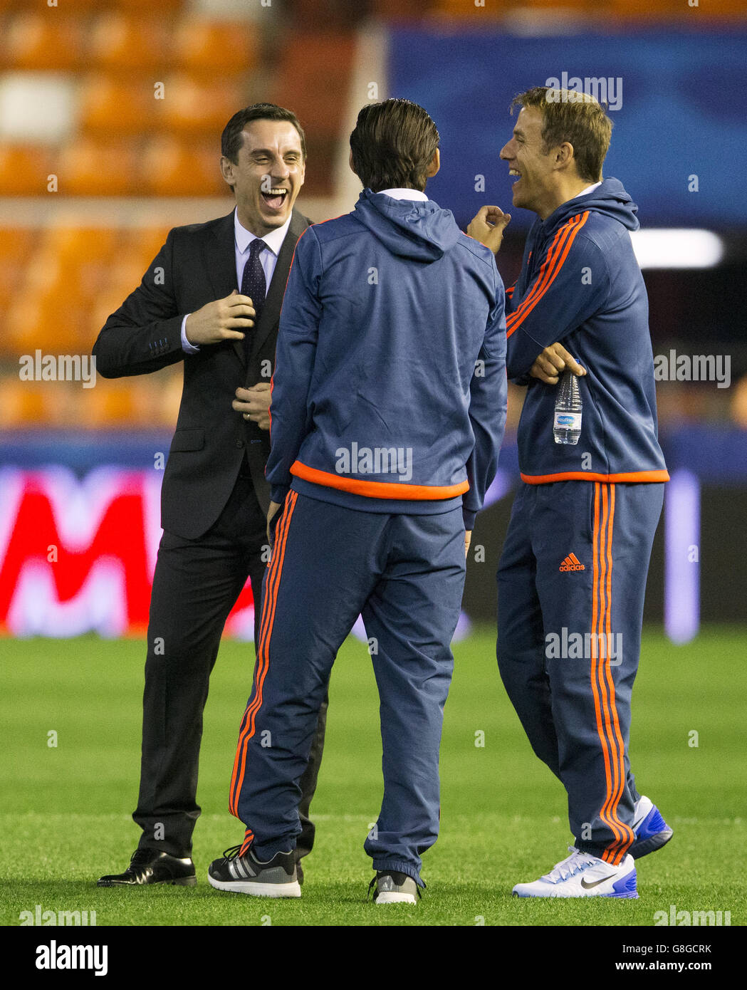 Valencia manager gary neville left and his assistants hi-res stock ...