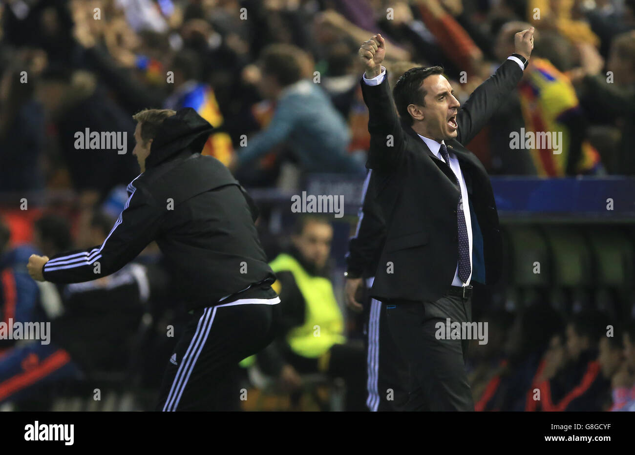 Valencia manager Gary Neville (right) and his assistant, brother Phil ...