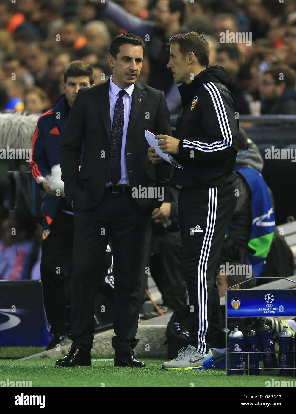 Valencia manager gary neville left and his assistant hi-res stock ...
