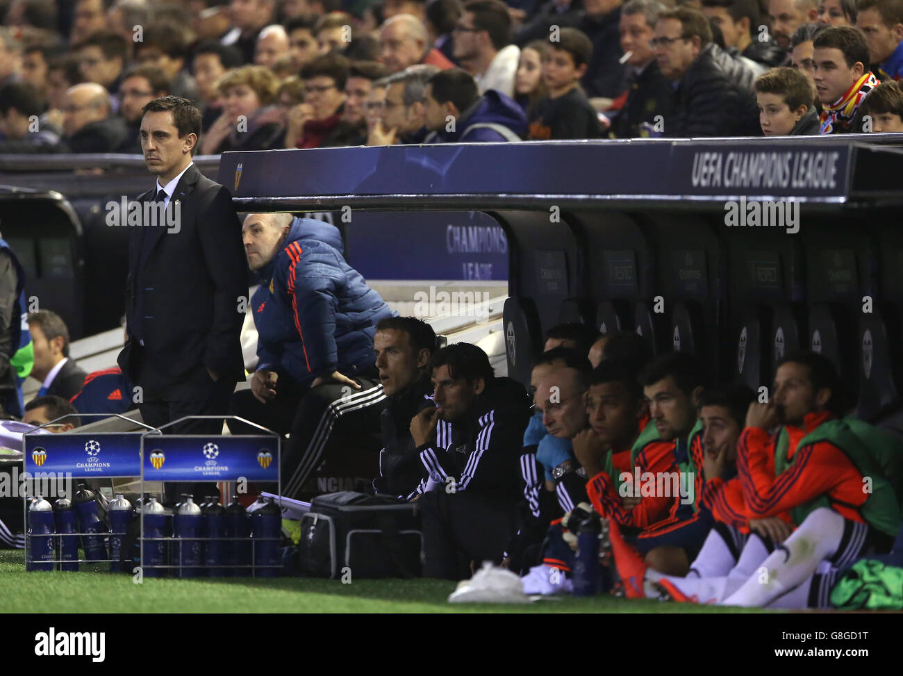 Valencia manager gary neville left and his assistants hi-res stock ...