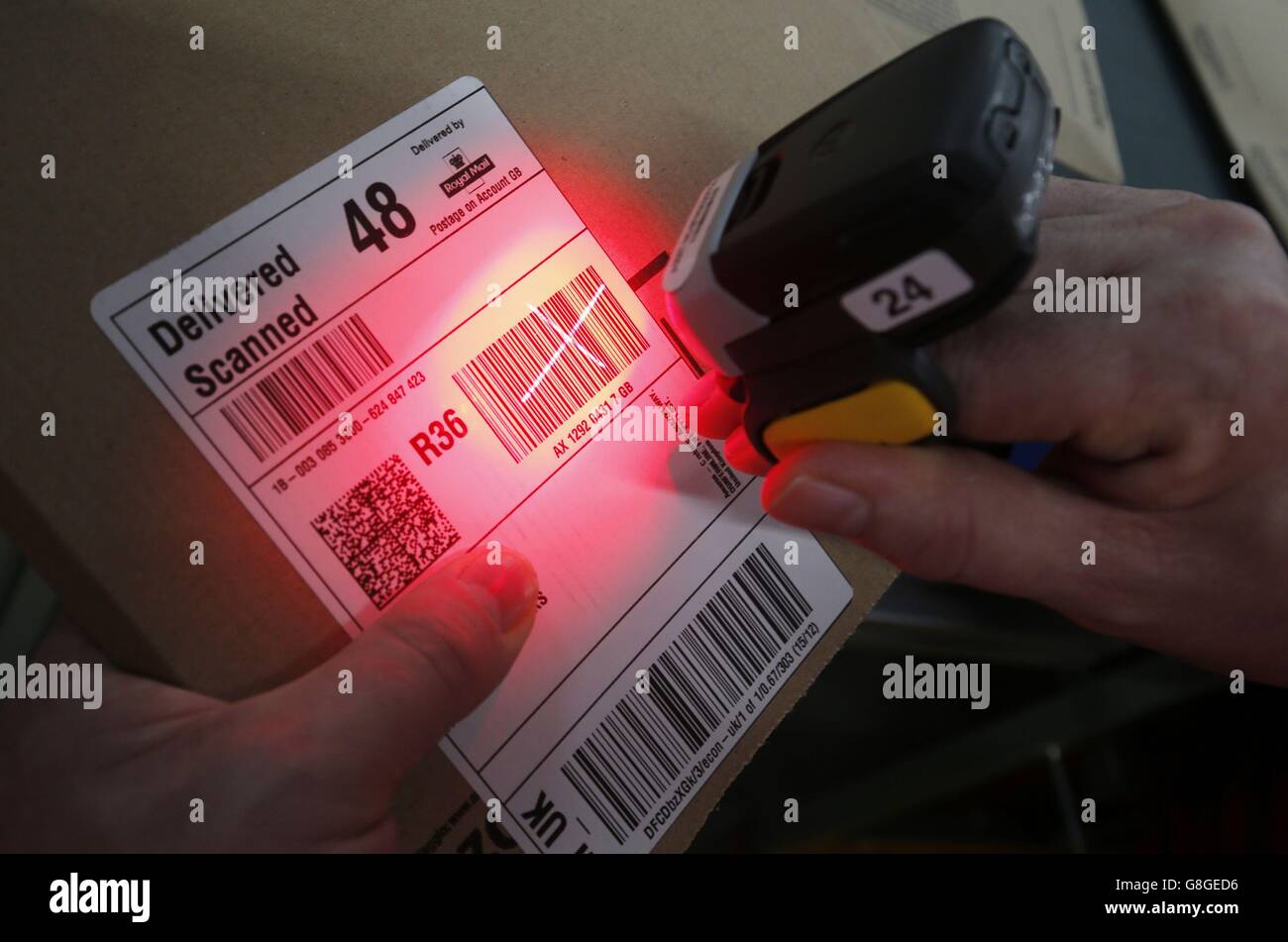 An employee at royal mails glasgow mail centre hi-res stock photography ...