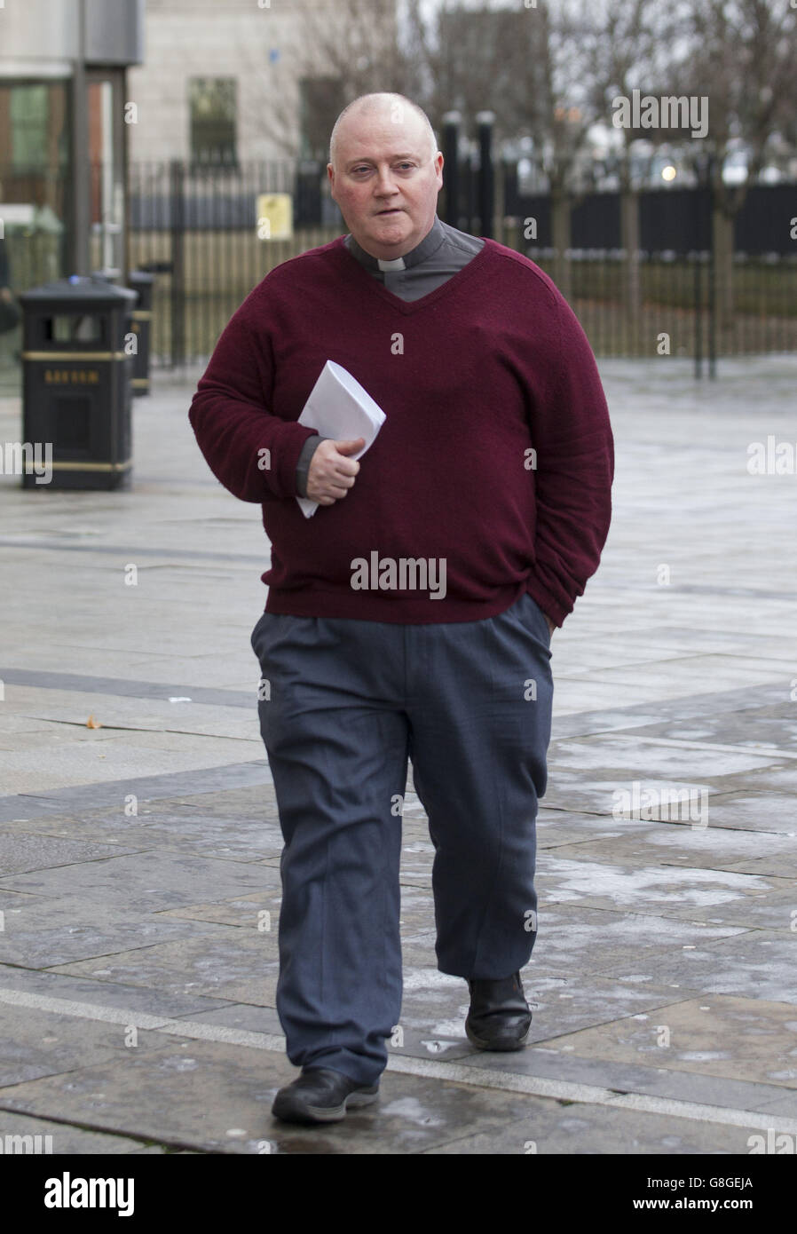 Father Patrick McCafferty leaving Belfast Magistrates' Court, where ...