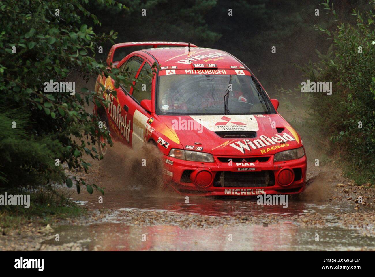 Winfield mitsubishi lancer evo iv rally car hi-res stock photography ...