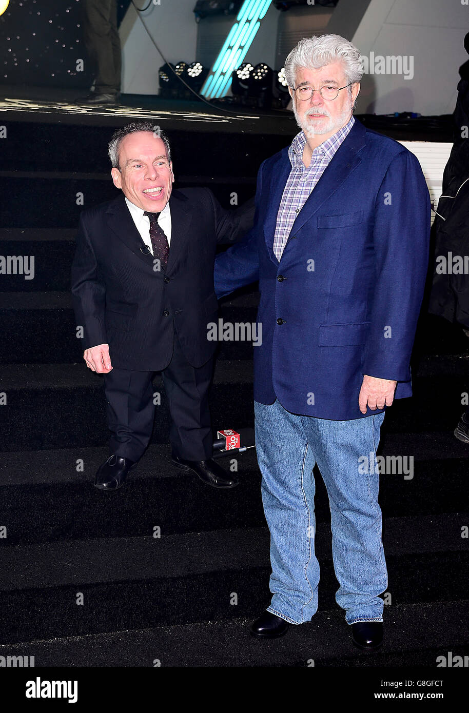 Warwick Davis and George Lucas attending the Star Wars: The Force ...