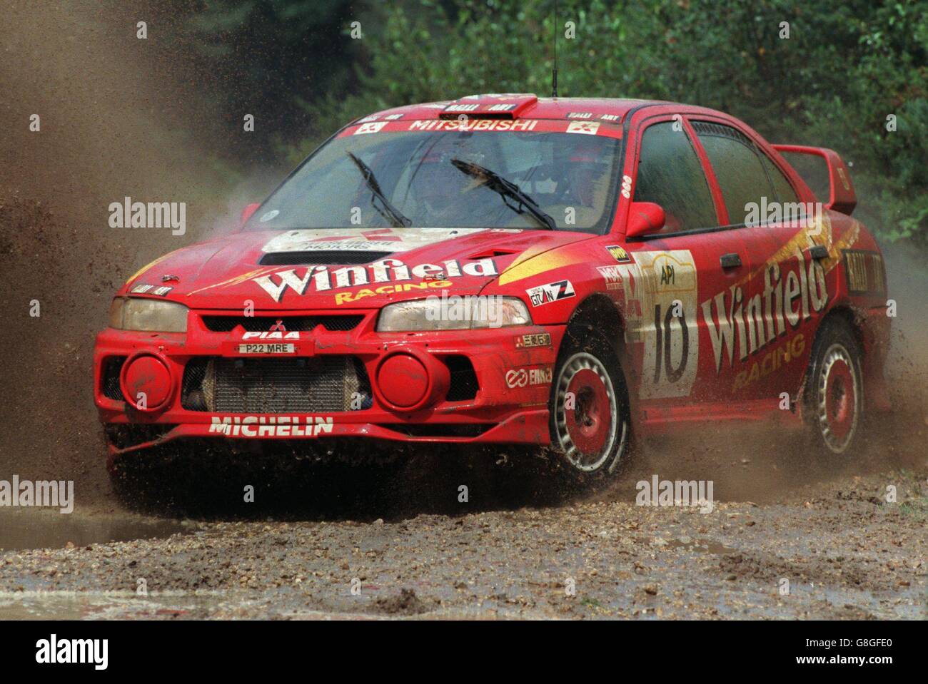 Winfield mitsubishi lancer evo iv rally car hi-res stock photography ...