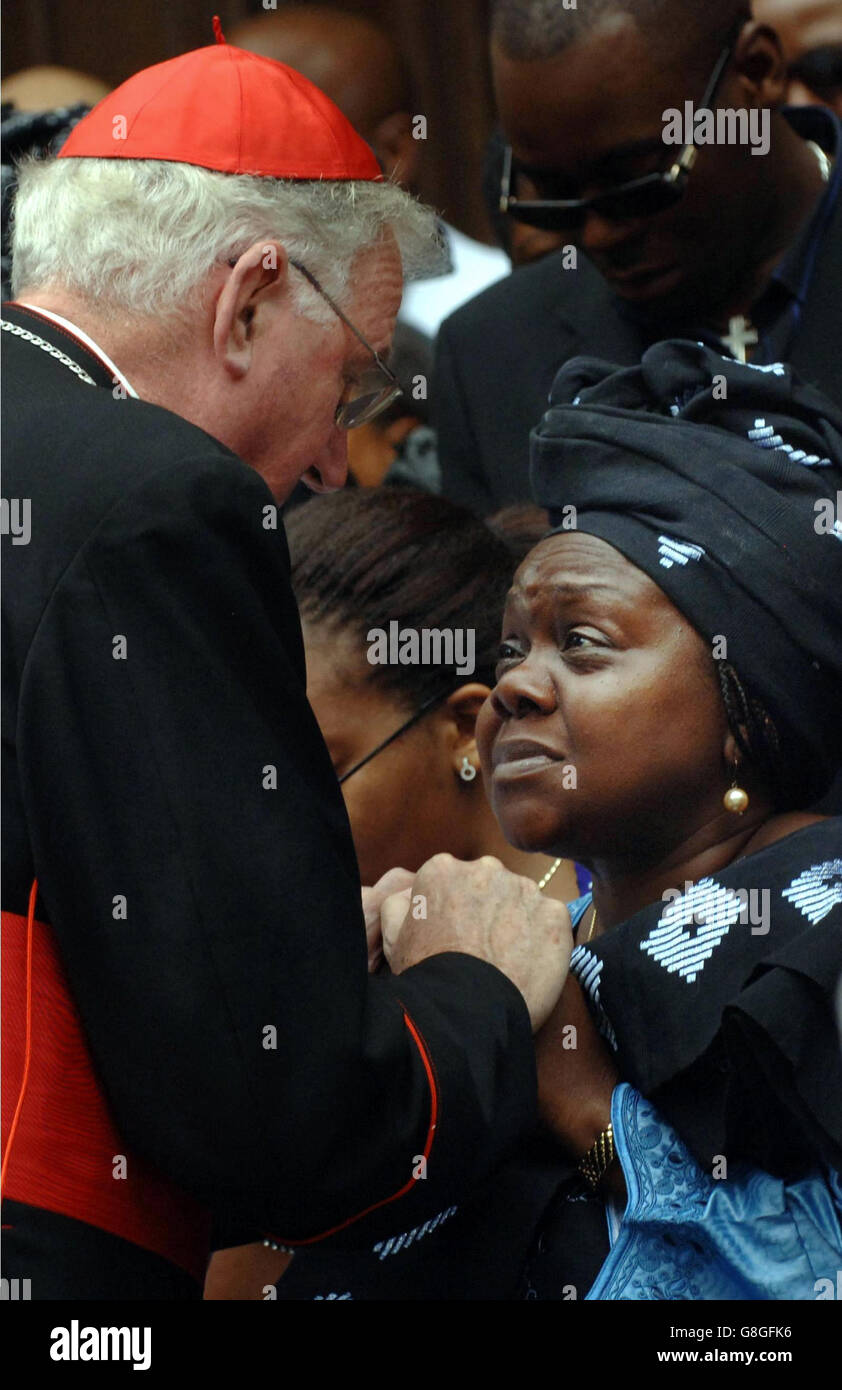 Marie Fatayi-Williams is comforted by Cardinal Cormac Murphy O'Connor ...