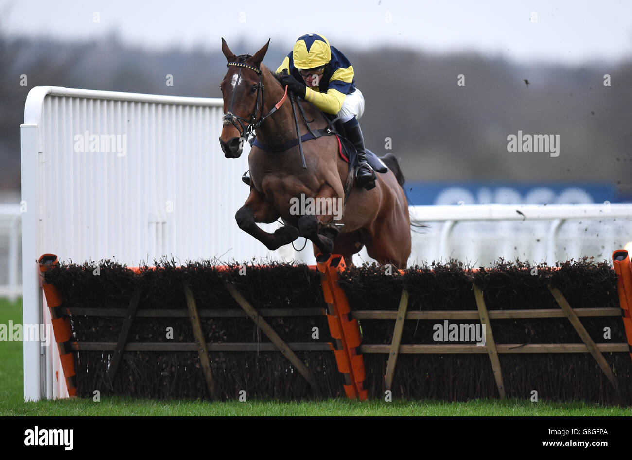 Masterplan ridden by jockey Graham Watters jumps the last on the way to ...
