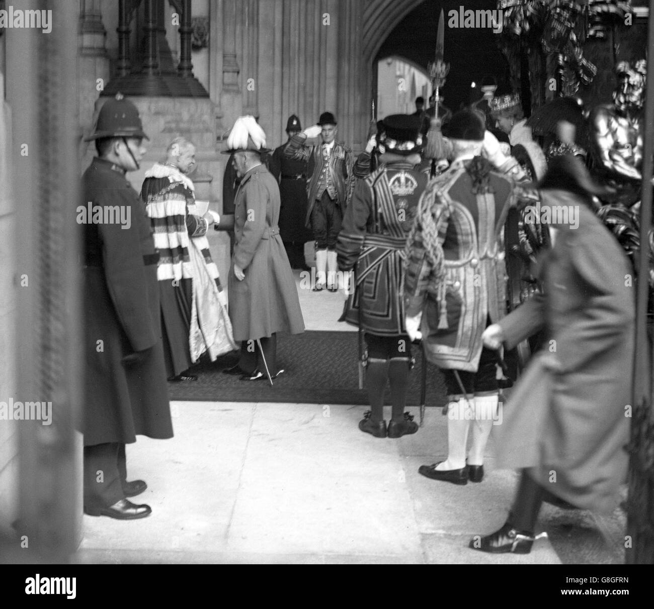 King George V and Queen Mary arrive at the House of Lords for the State ...