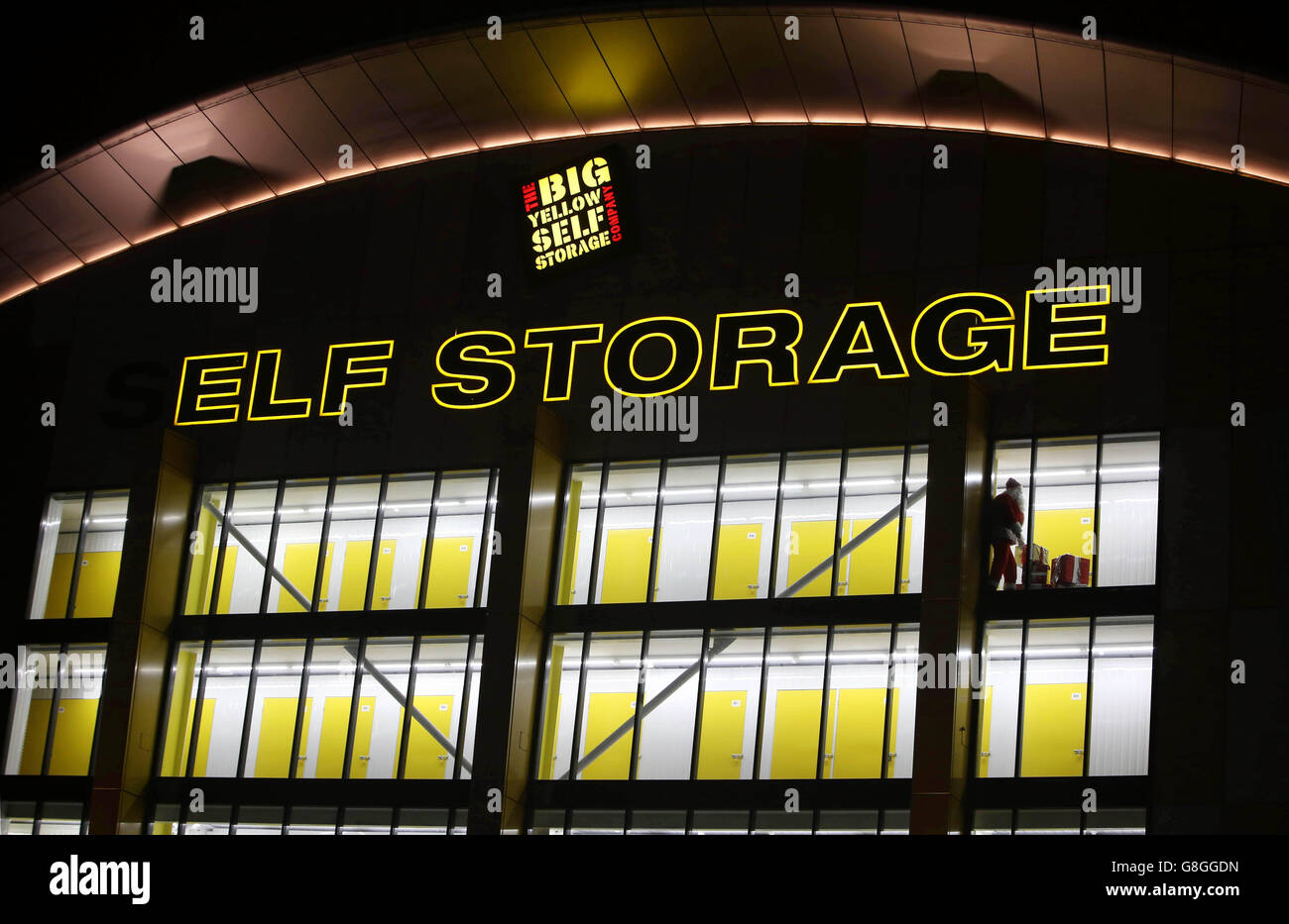 A Santa figure in the window of The Big Yellow Self Storage centre in ...