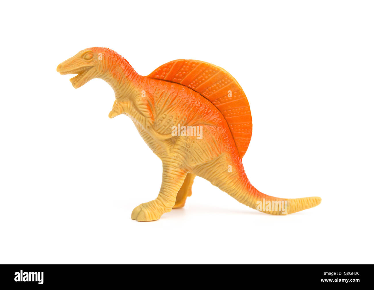 side view orange spinosaurus toy on a white background Stock Photo - Alamy