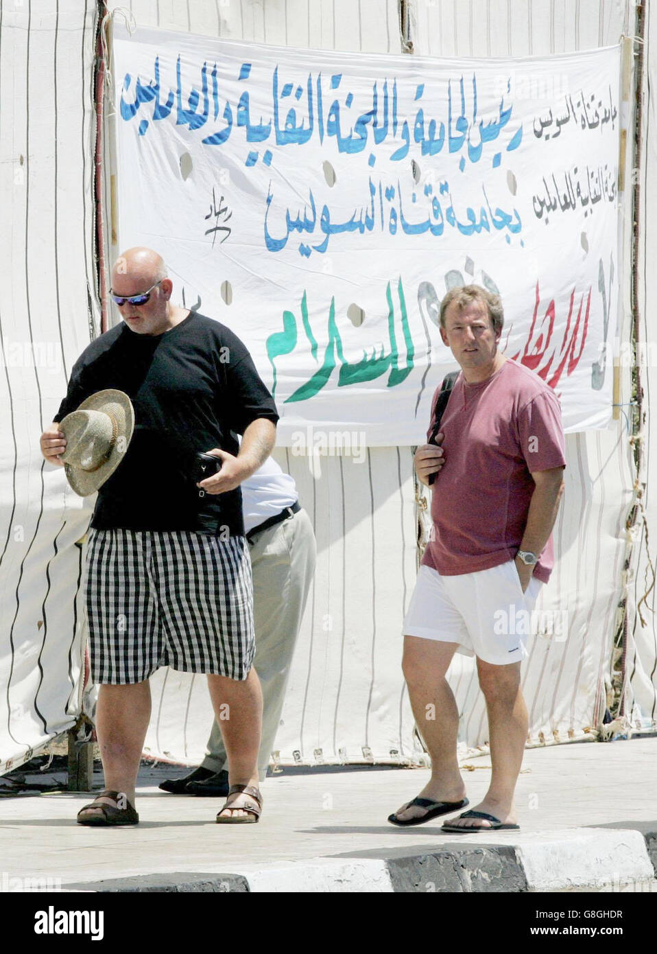 Christopher, left, and Peter Bracci arrive at the Ghazala Gardens Hotel ...