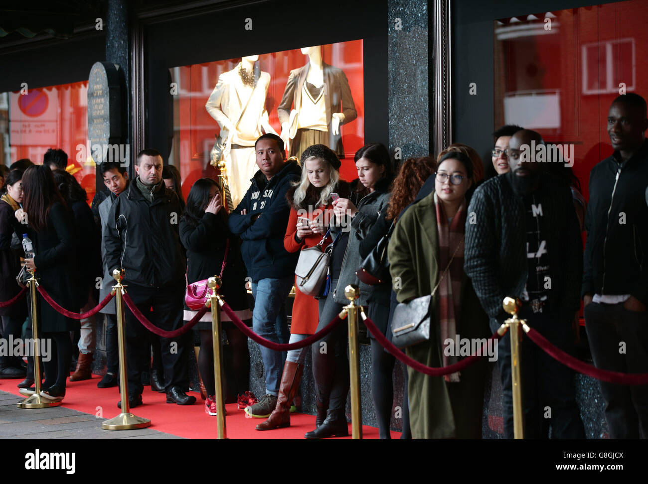 People queuing outside luxury department store Harrods for the Boxing ...