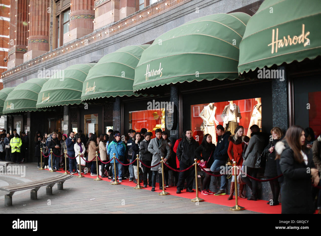 People queuing outside luxury department store Harrods for the Boxing ...