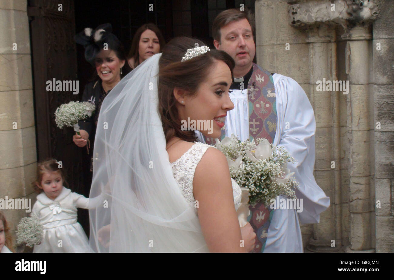 Lucy outside selby abbey following her wedding hi-res stock photography ...