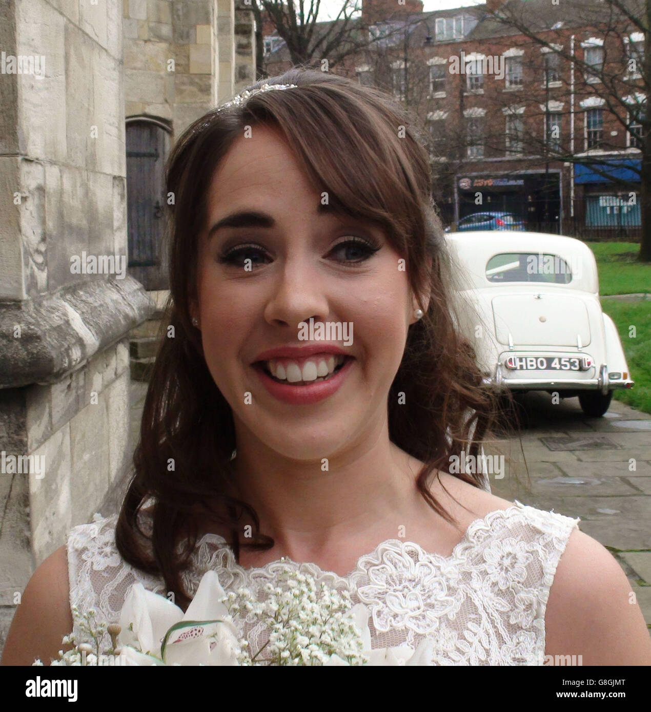 Lucy outside selby abbey following her wedding hi-res stock photography ...