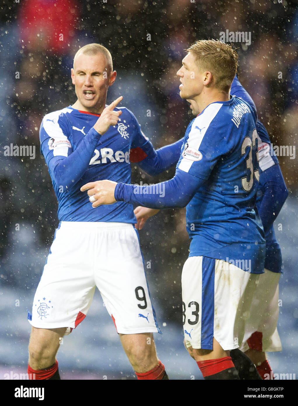 Rangers Kenny Miller (left) celebrates scoring his side second goal ...