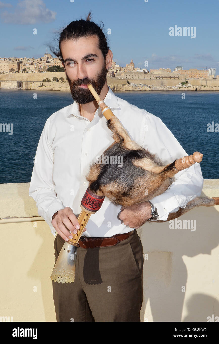 Francesco Sultana holds his Zaqq which is similar to the bagpipes and ...