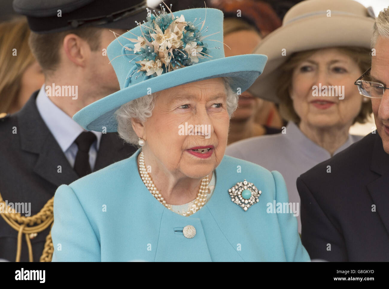 Queen Elizabeth II embarks on a boat for a trip across Valletta Harbour ...