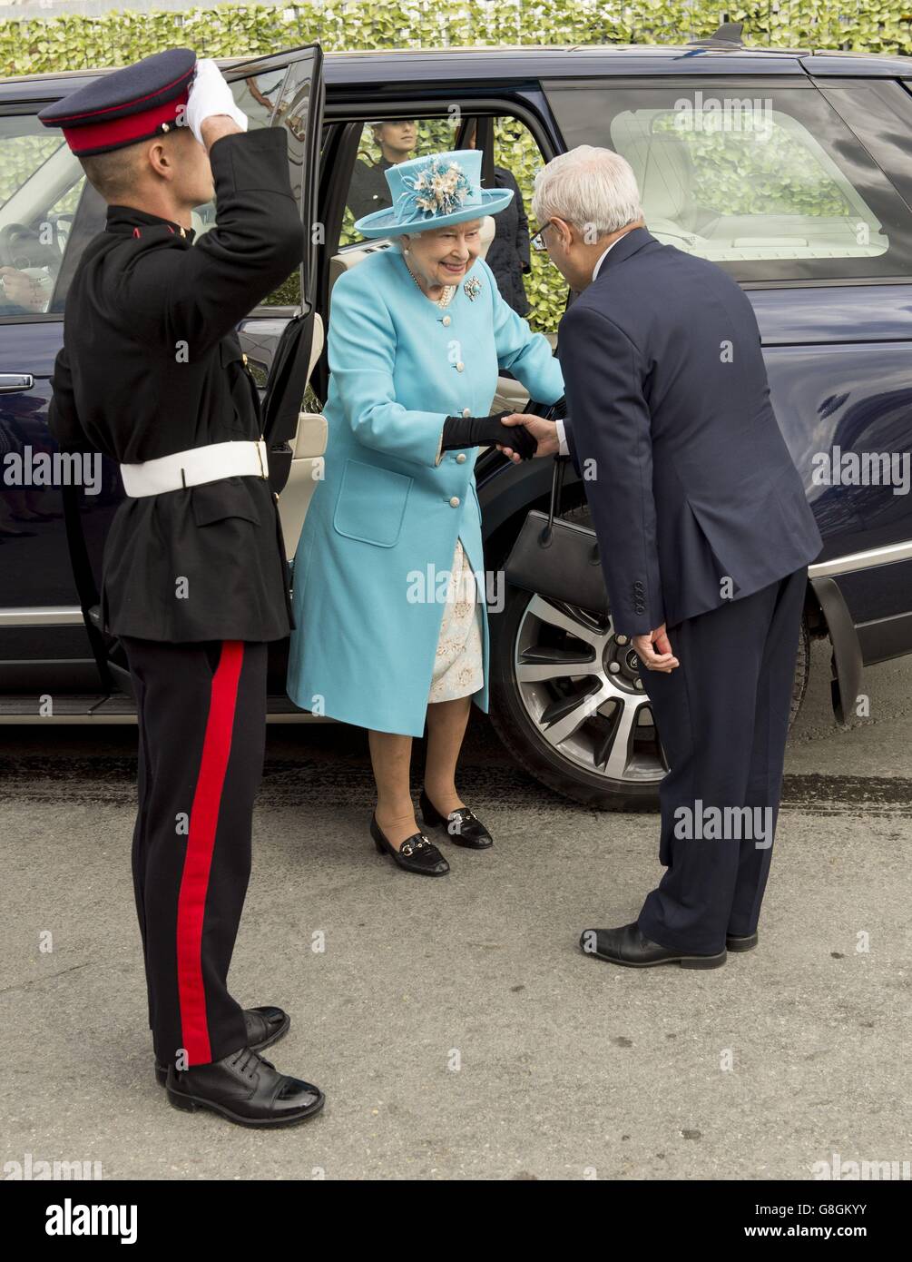 Queen Elizabeth II embarks on a boat for a trip across Valletta Harbour ...
