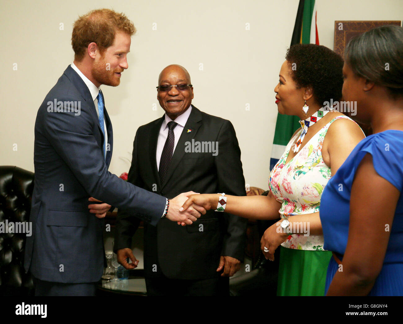 Prince Harry shakes the hands with Tobeka Madiba Zuma the wife of South ...