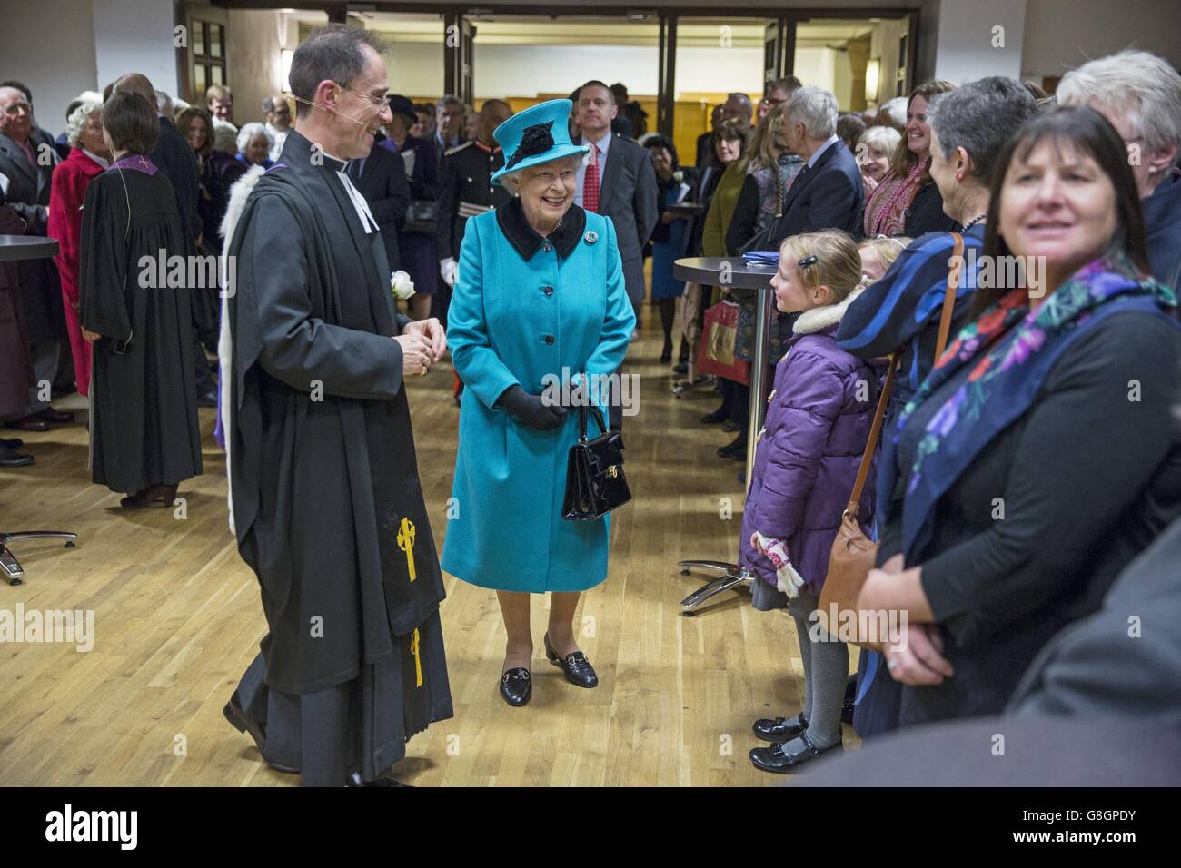 Queen Elizabeth II meets the congregation before unveiling a plaque at ...