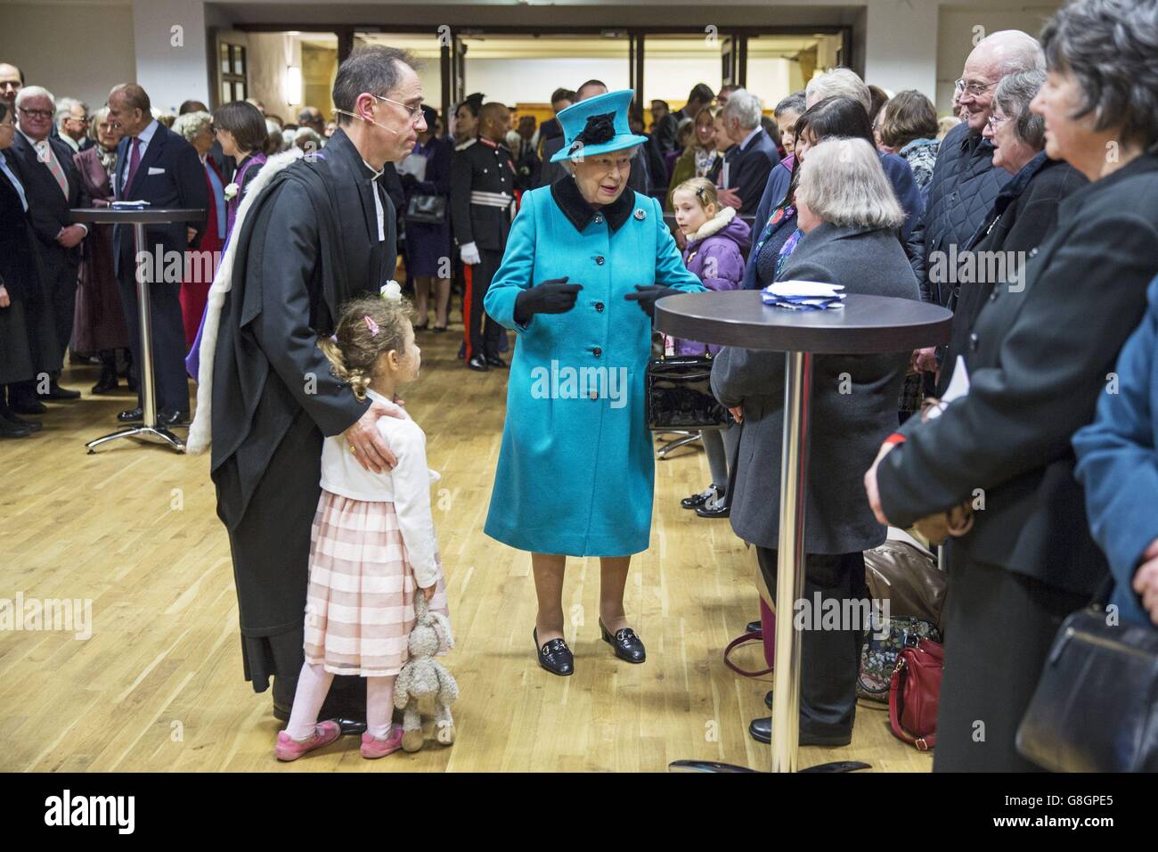 Queen Elizabeth II meets the congregation before unveiling a plaque at ...