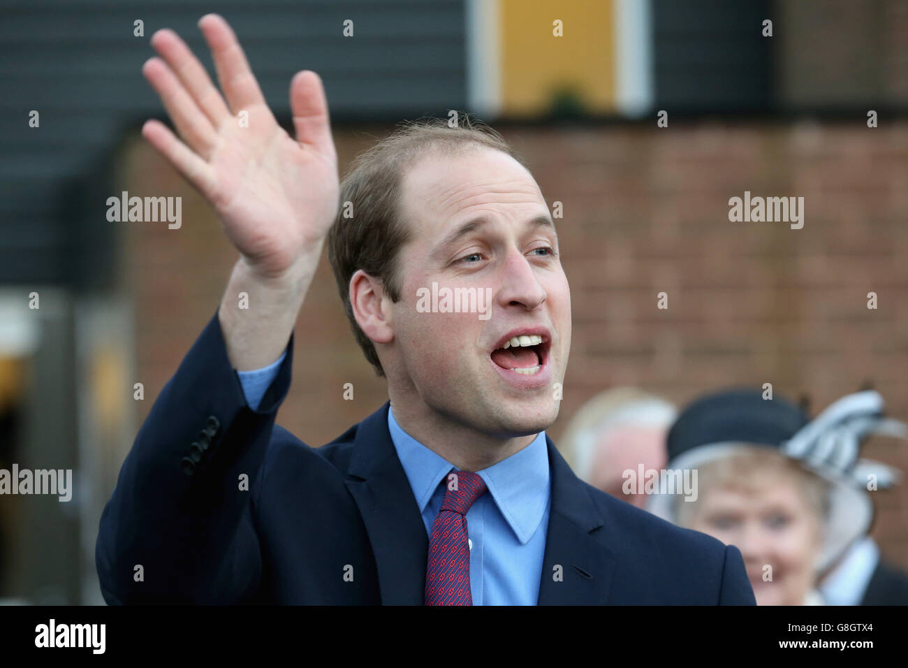 The Duke of Cambridge waves to members of the public after his visit to ...