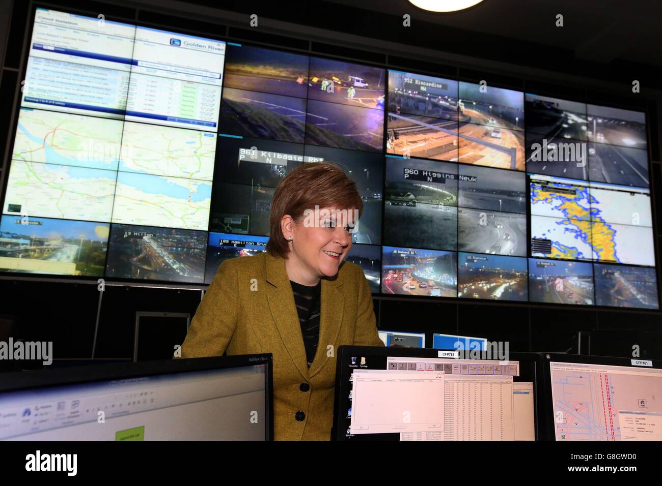 First Minister Nicola Sturgeon talks to staff during a visit to Traffic ...