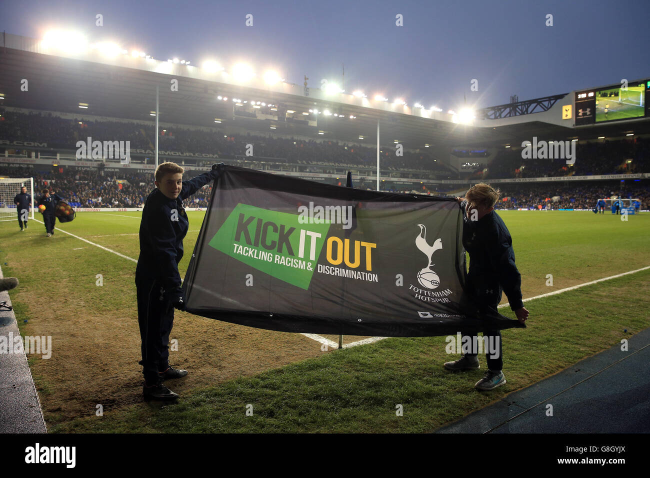 A Kick it Out campaign banner is paraded around the ground ahead of ...