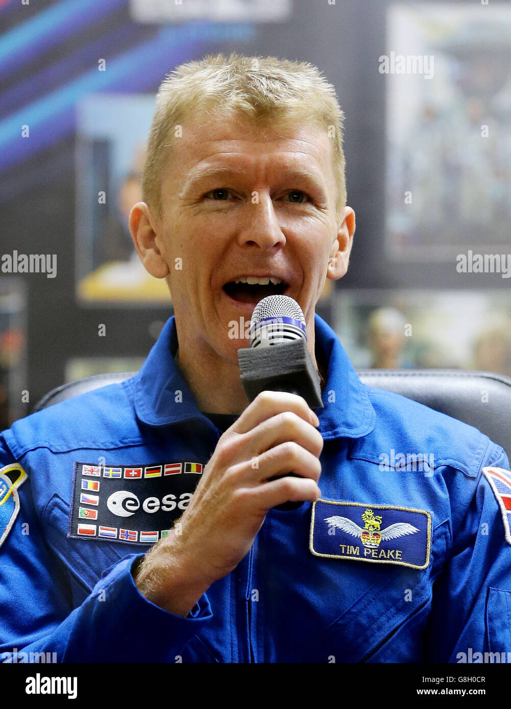British astronaut Tim Peake speaks during the crew's news conference at ...