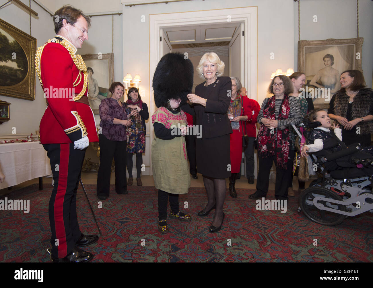 Alice Leigh tries on a bearskin hat belonging to Captain Matt Wright of ...