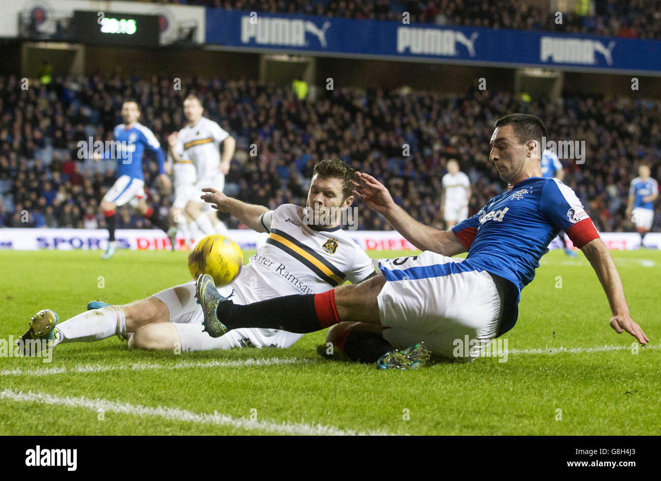 Dumbarton's Mark Docherty (left) and Rangers' Jason Holt (right) battle ...