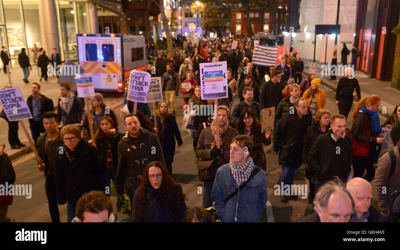 Demonstrators march past Conservative and Labour Party headquarters in ...