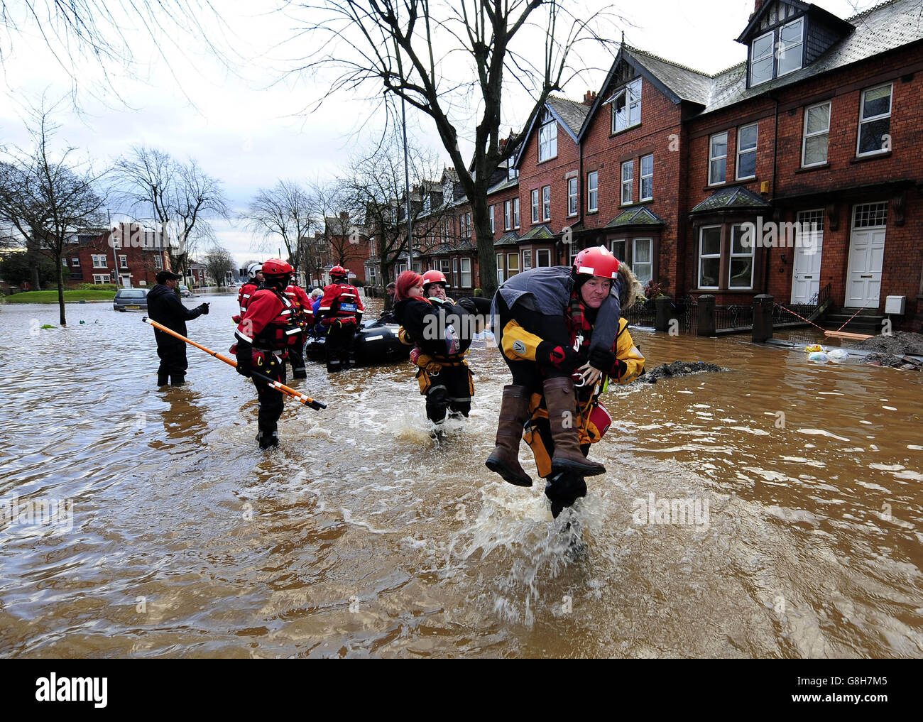 Fire and Rescue teams continue their work to bring people out of ...