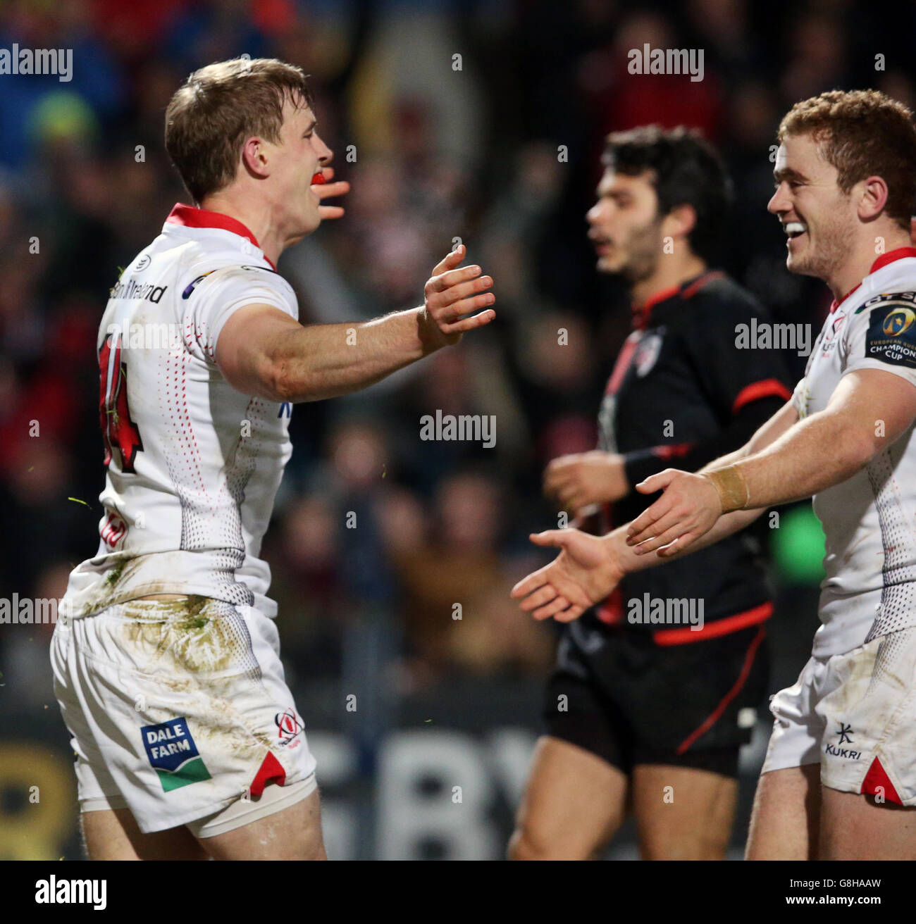 Ulster's Andrew Trimble (left) celebrates scoring his side's second try ...