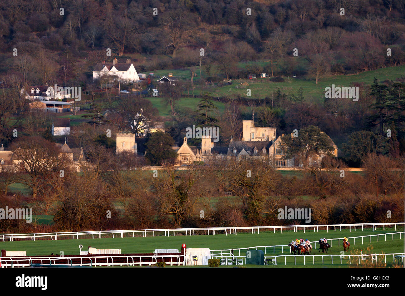 General view across the race course as the runners and riders make ...