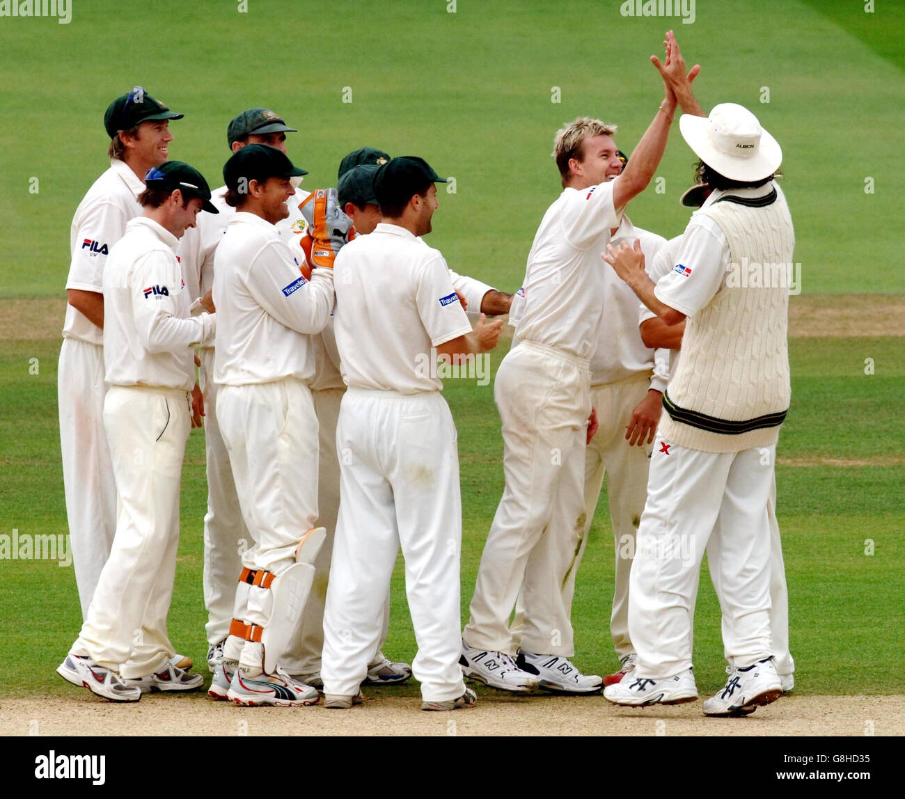 Australia's Brett Lee celebrates with team-mate Jason Gillespie (R ...