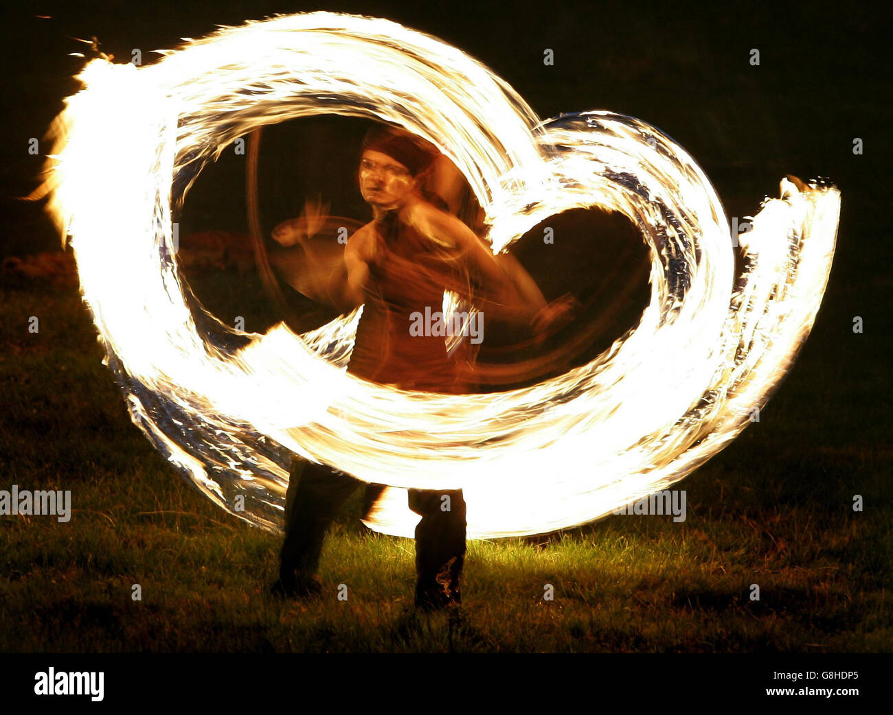 Fire dancers before torching a giant Wicker Man, about 35 feet in ...